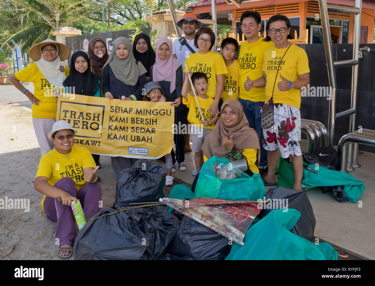 Group portrait of volunteers from environmental group Trash Hero ...