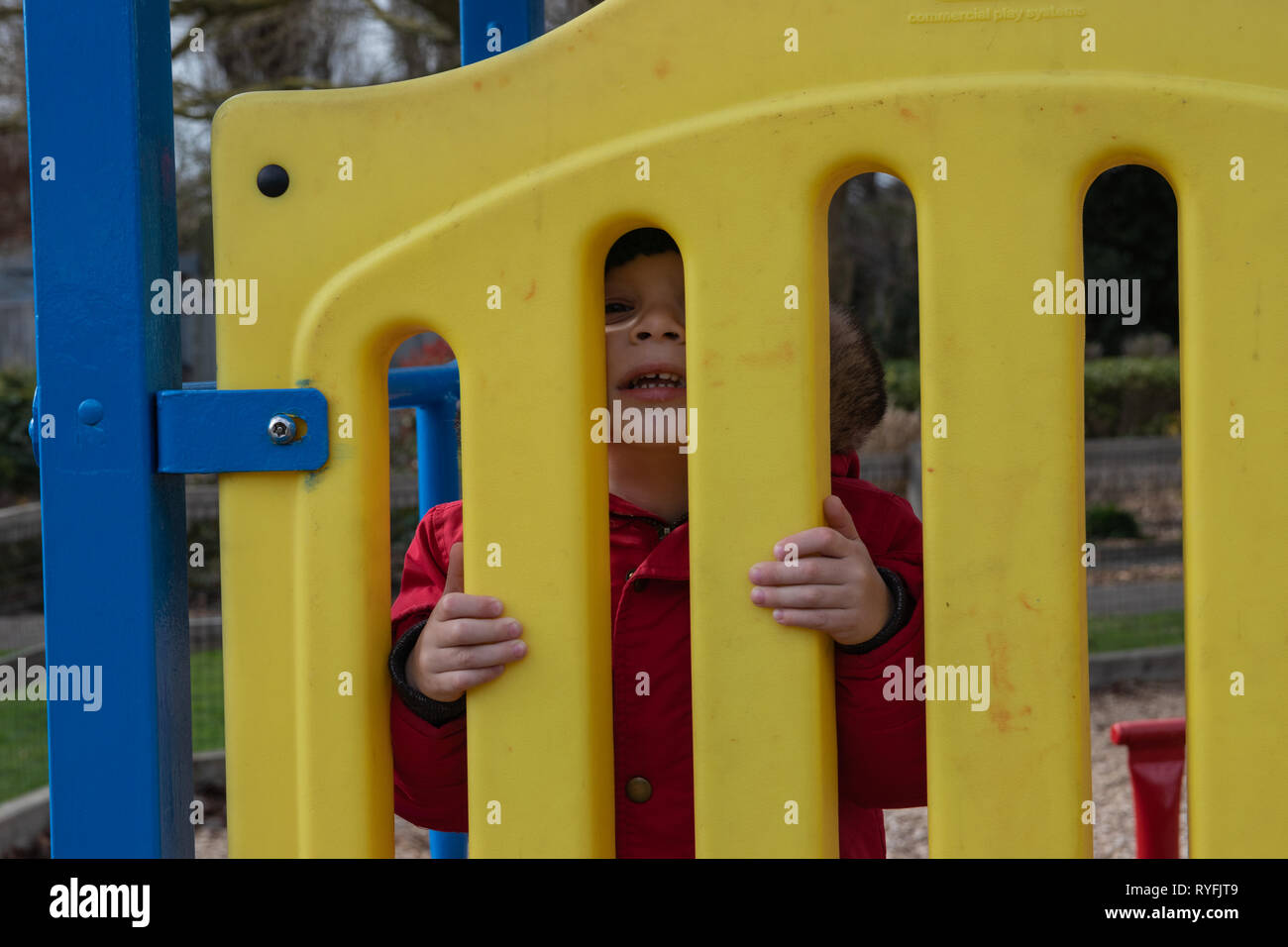 Boy looking through frame hi-res stock photography and images - Alamy