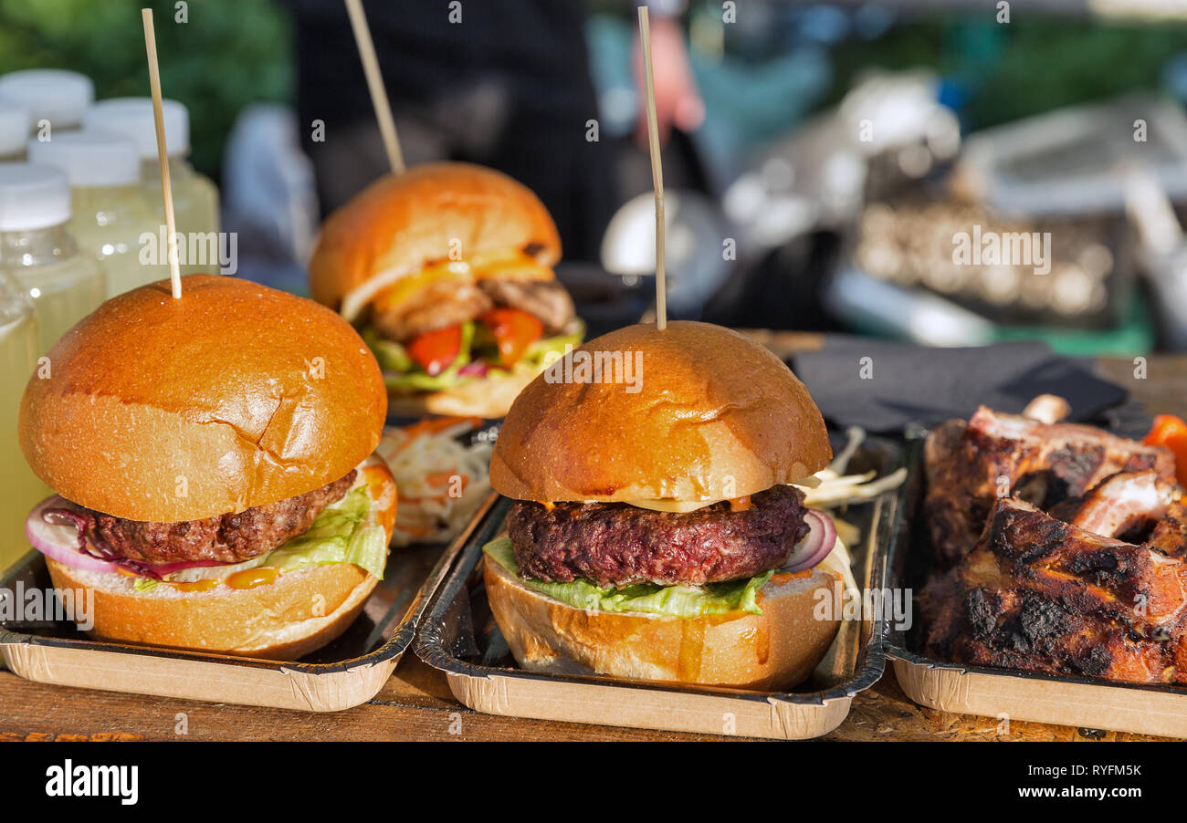 Street food hamburgers closeup outdoor at take away stall Stock Photo ...