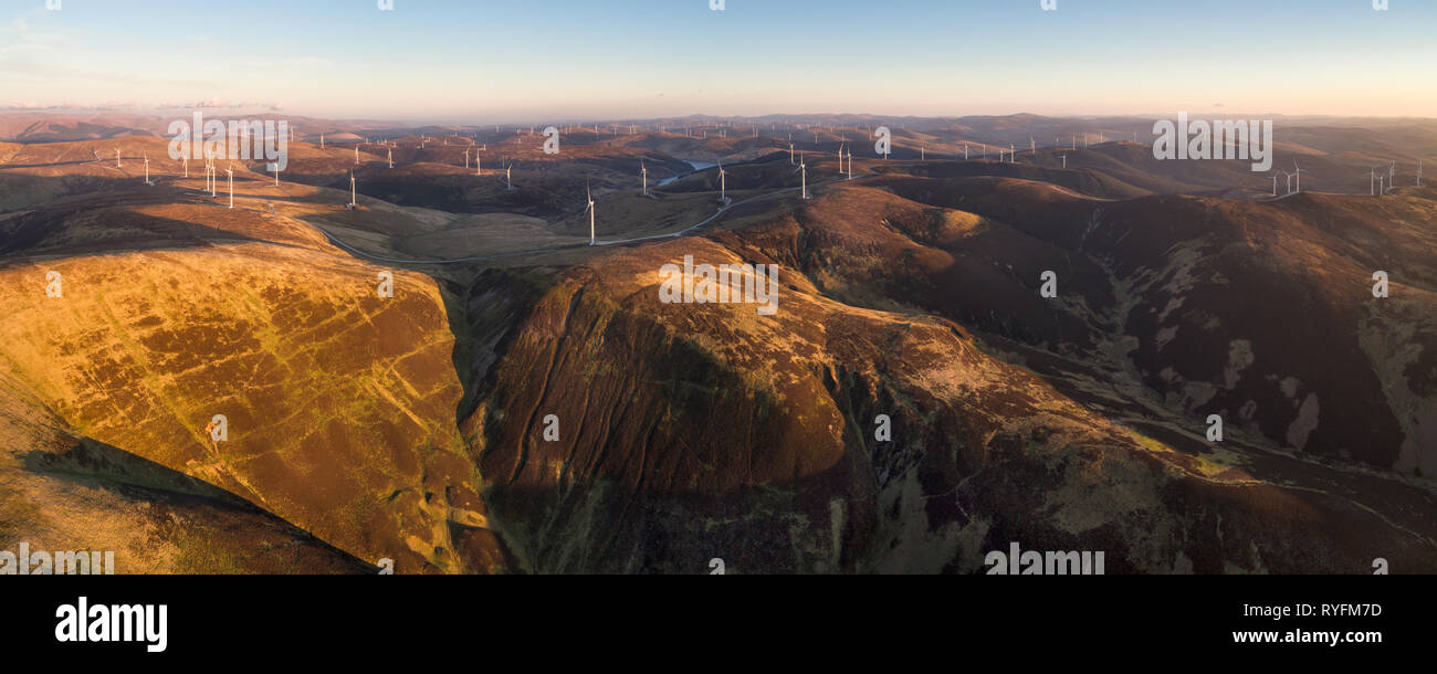 Aerial panorama showing the 206 turbine Clyde Wind Farm in evening ...