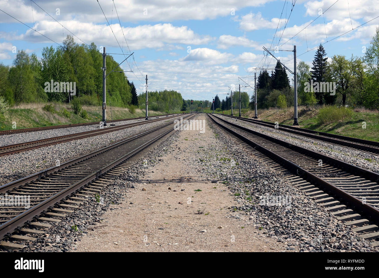 railway track with a background of clouds - Image Stock Photo - Alamy