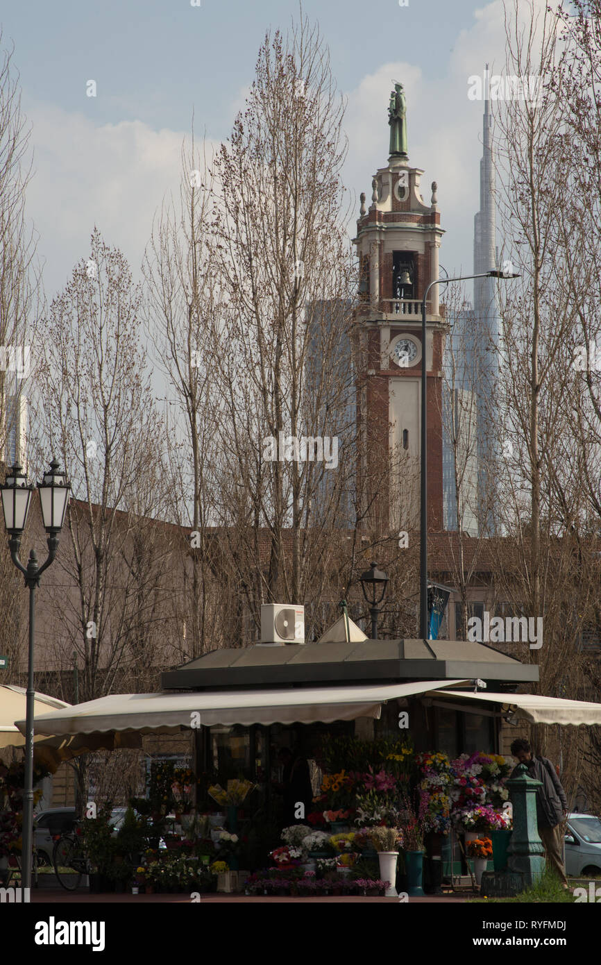 Milan street scene with flower stall, trees and architecture, Milan ...