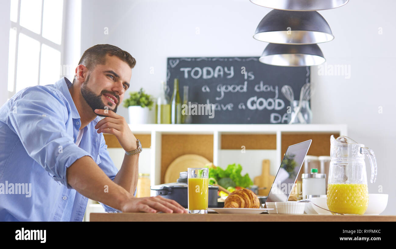 a business man breakfasts with notebook and juice Stock Photo - Alamy
