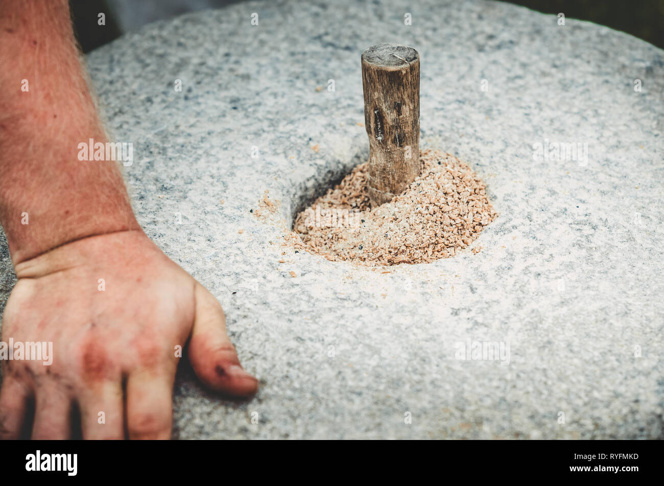 Grinding Grain, Quern Stone Stock Photos & Grinding Grain, Quern Stone ...