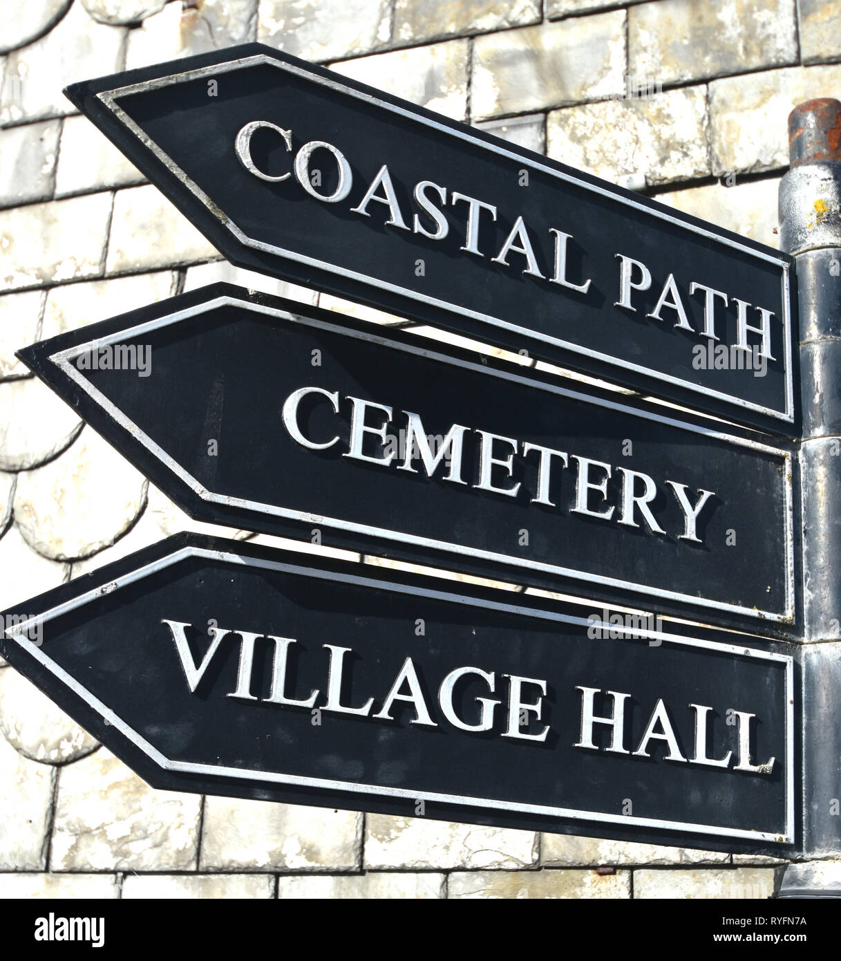 Metal village sign in the rural coastal village of Mortehoe, North ...