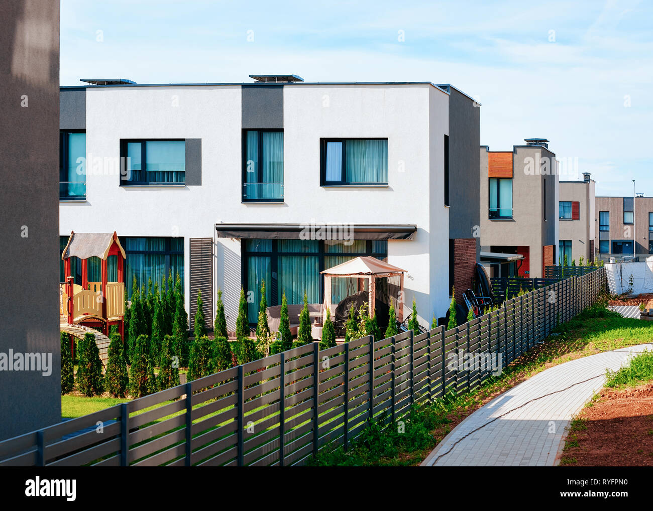 Apartment residential home and house building complex with gate concept ...