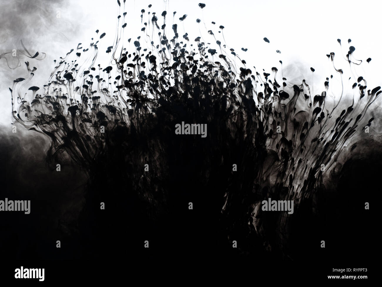 black ink explosion in water Stock Photo - Alamy