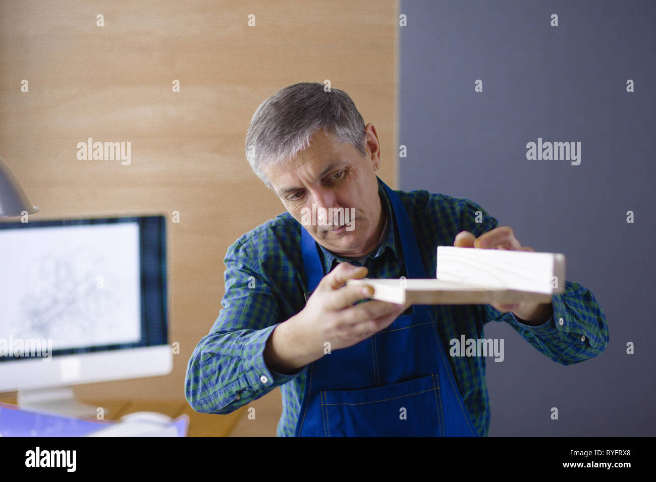 profession, carpentry, woodwork and people concept - carpenter testing ...