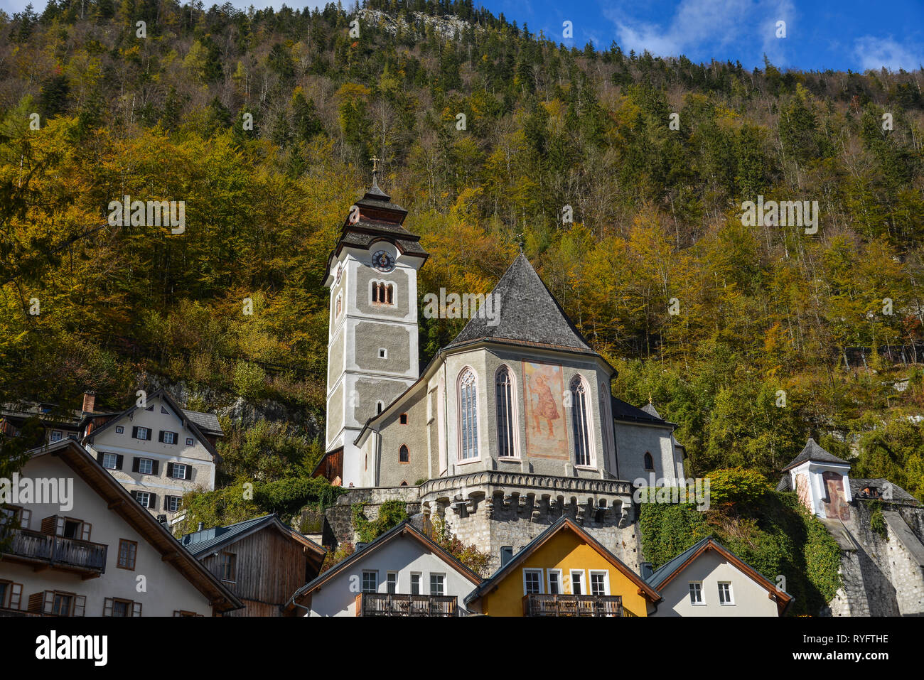 Stone church at old town of Hallstatt, Austria. Hallstatt is a charming ...