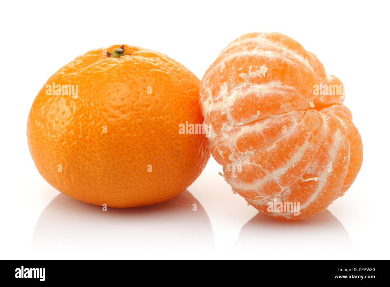 Whole and peeled mandarin fruits isolated on white background Stock ...