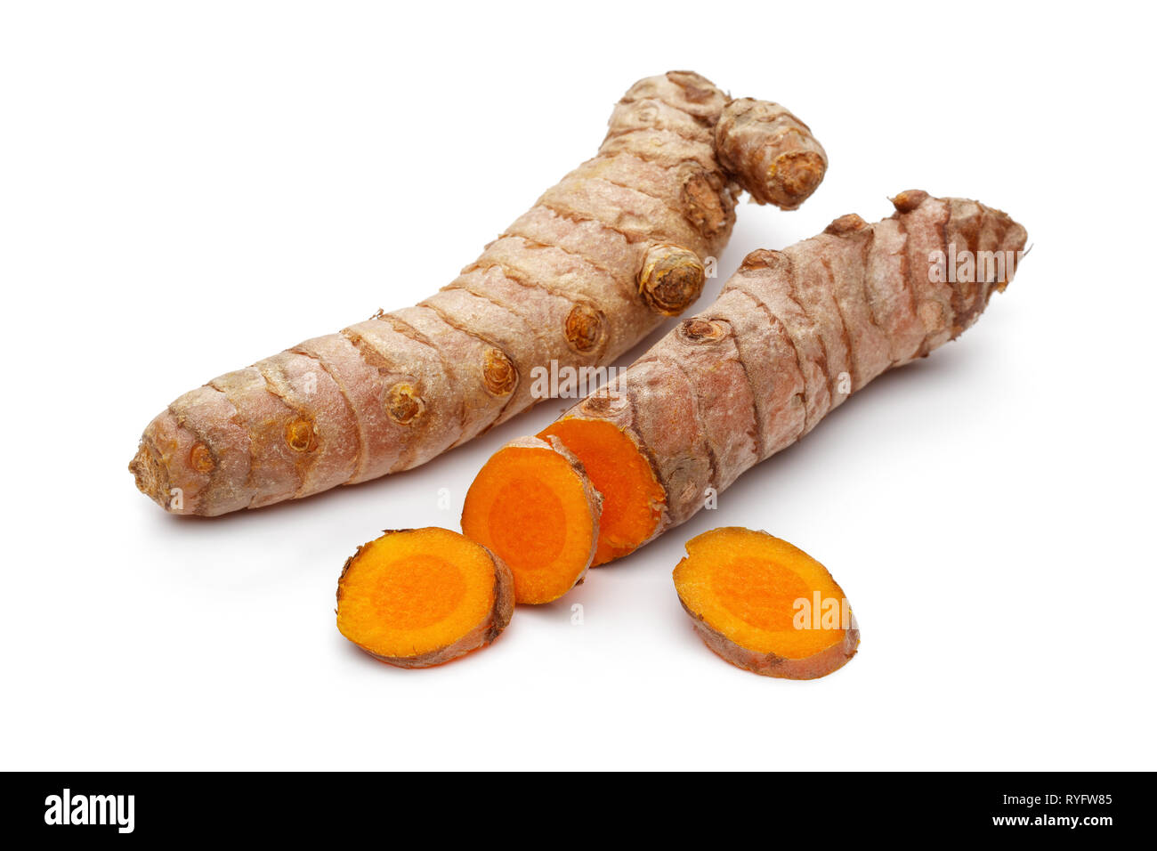 Fresh whole turmeric root and slices isolated on white background Stock ...