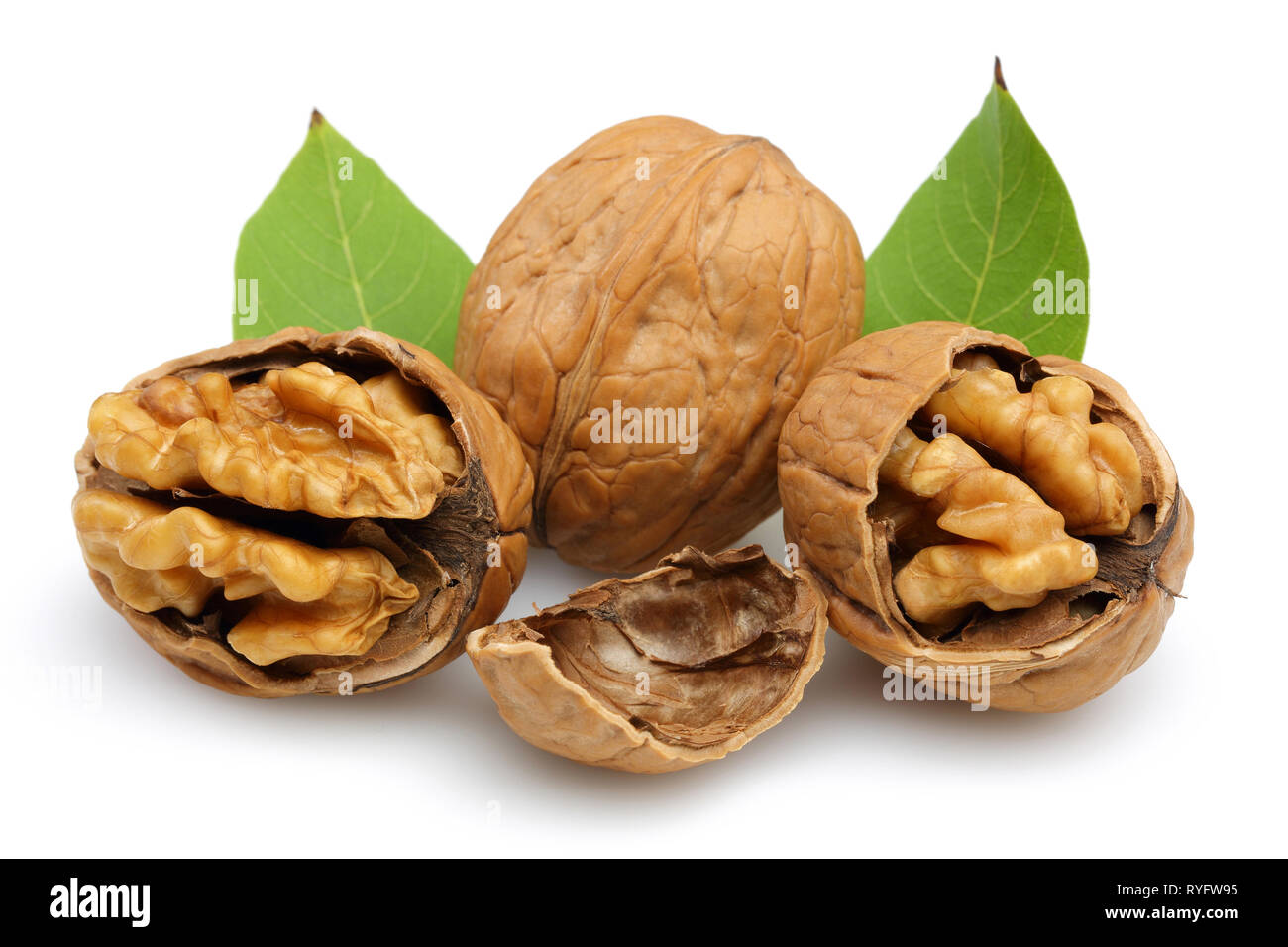 Walnut and cracked walnut with leaf isolated on white background Stock ...