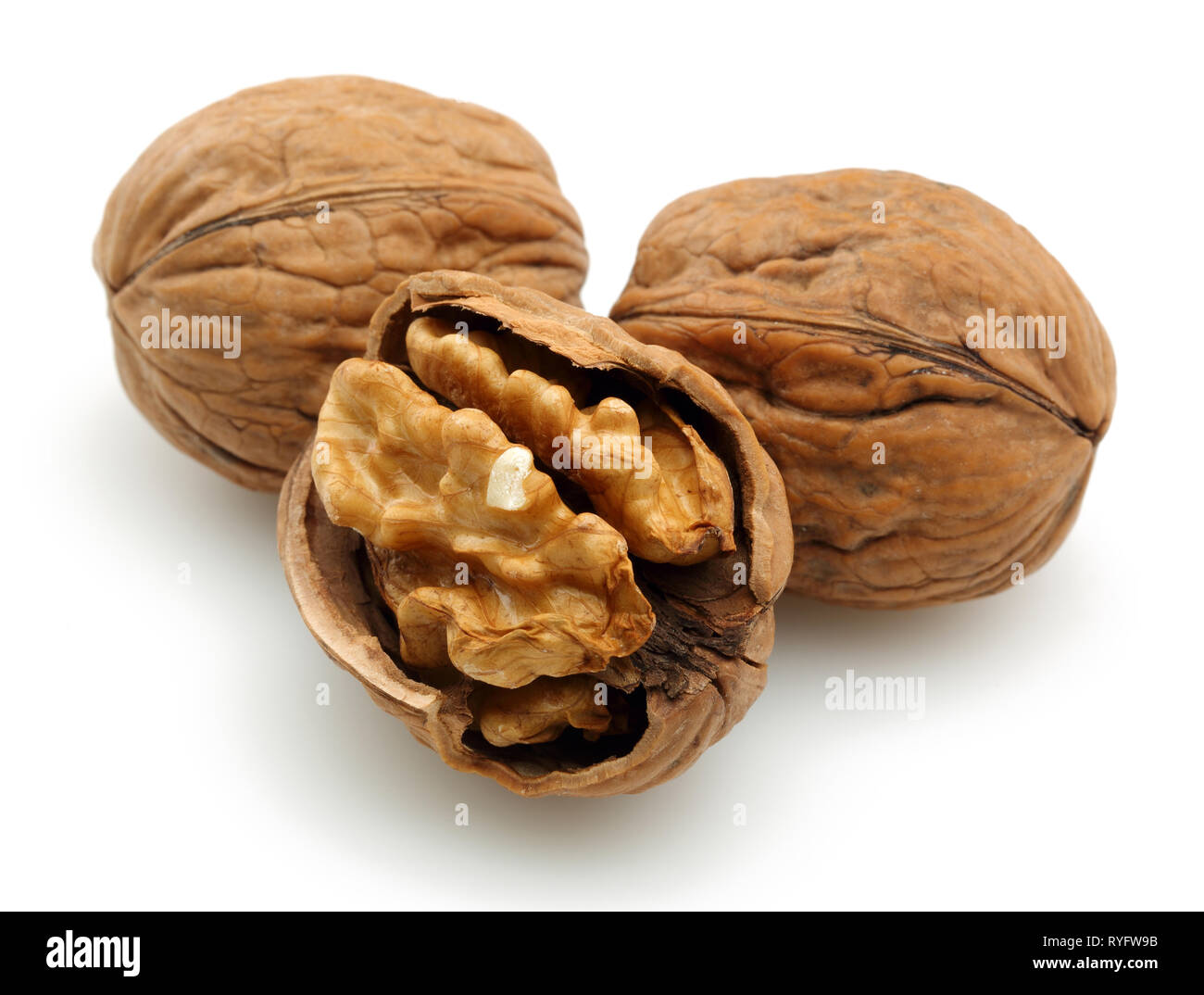 Whole and cracked walnuts isolated on white background Stock Photo - Alamy