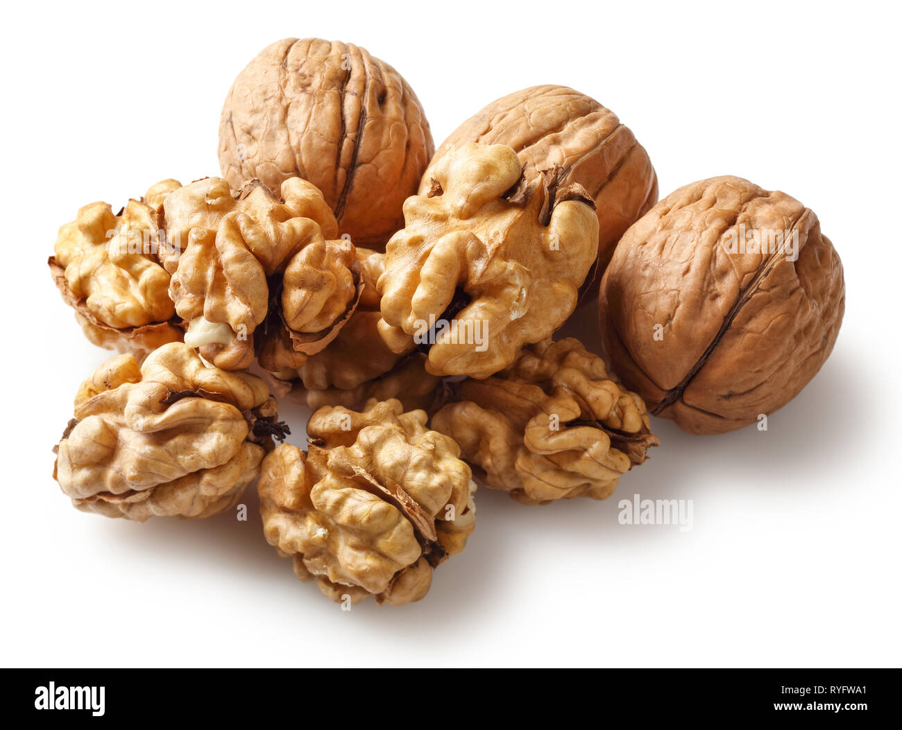 Whole and cracked walnuts isolated on white background Stock Photo - Alamy