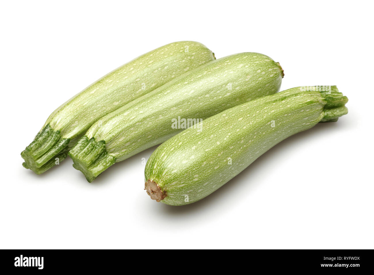 Whole fresh zucchini isolated on white background Stock Photo - Alamy