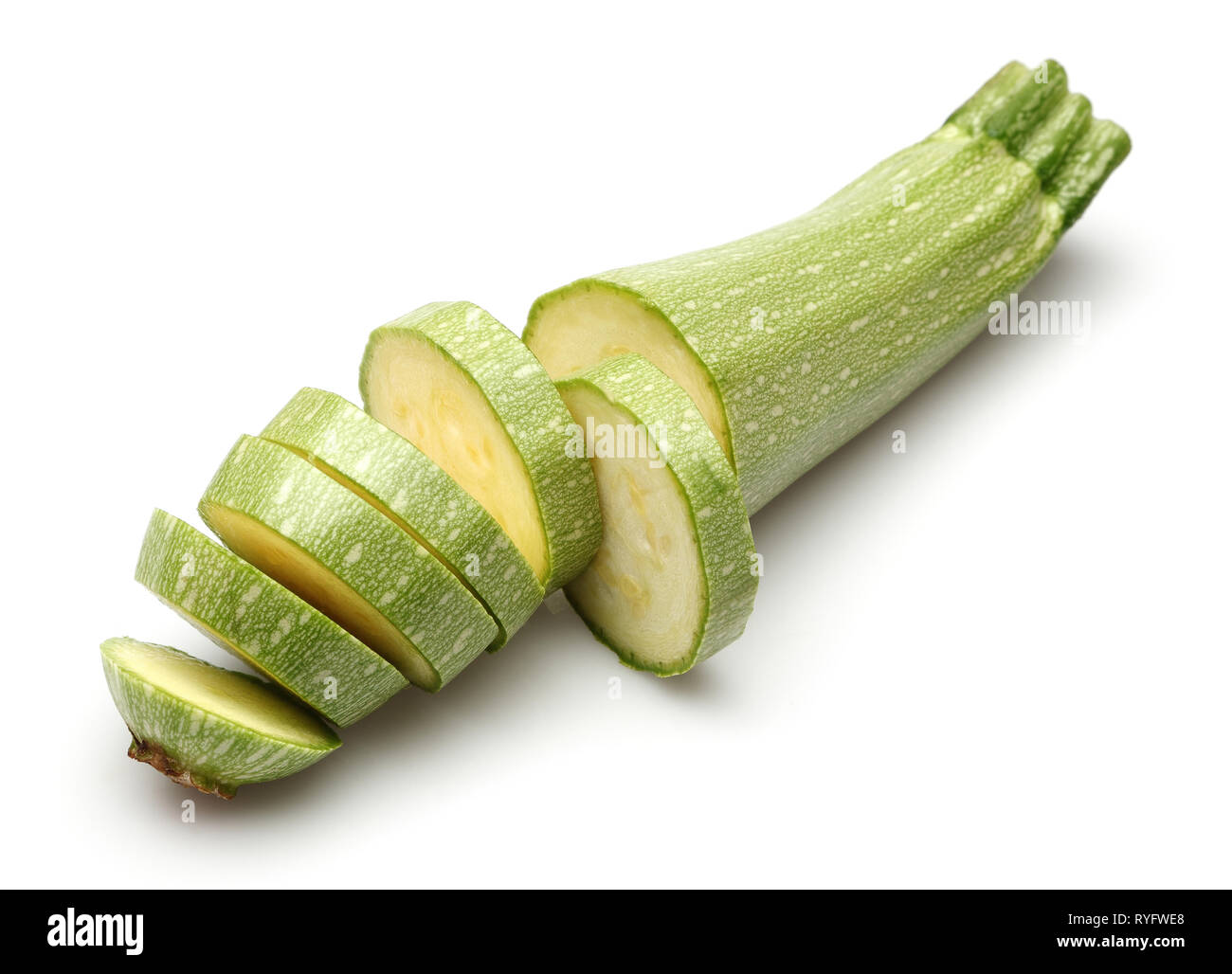 Sliced green zucchini isolated on white background Stock Photo - Alamy