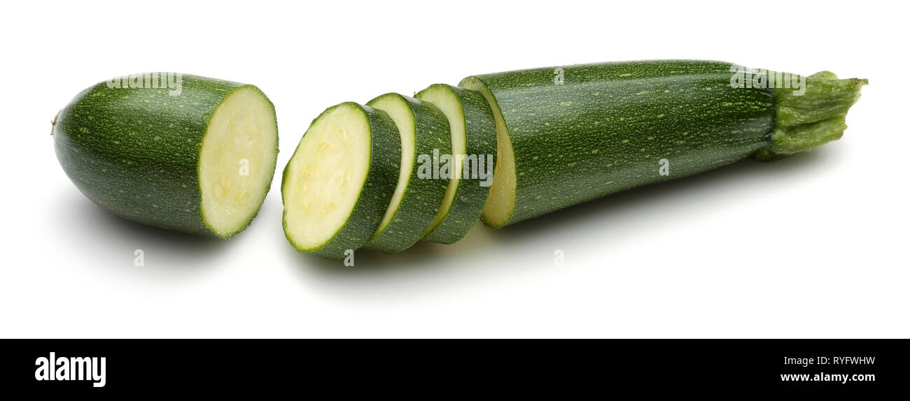 Sliced green zucchini isolated on white background Stock Photo - Alamy