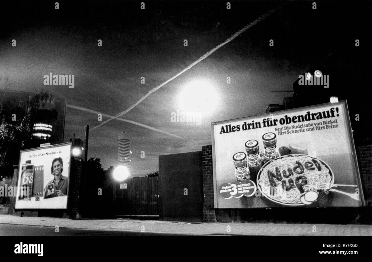 billboards and airplane contrails at night, Frankfurt, Germany Stock ...