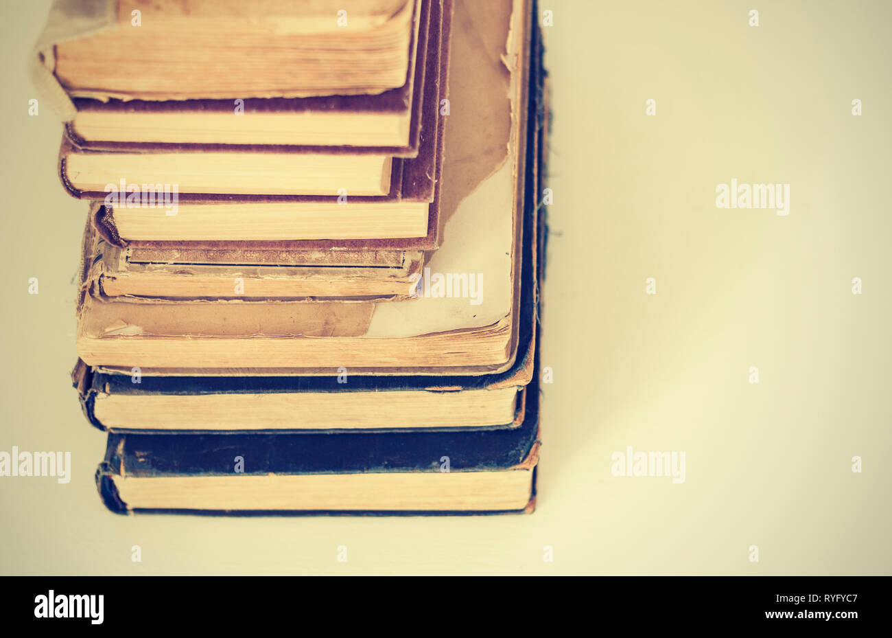 Stack of old books education retro concept background, many books piles ...