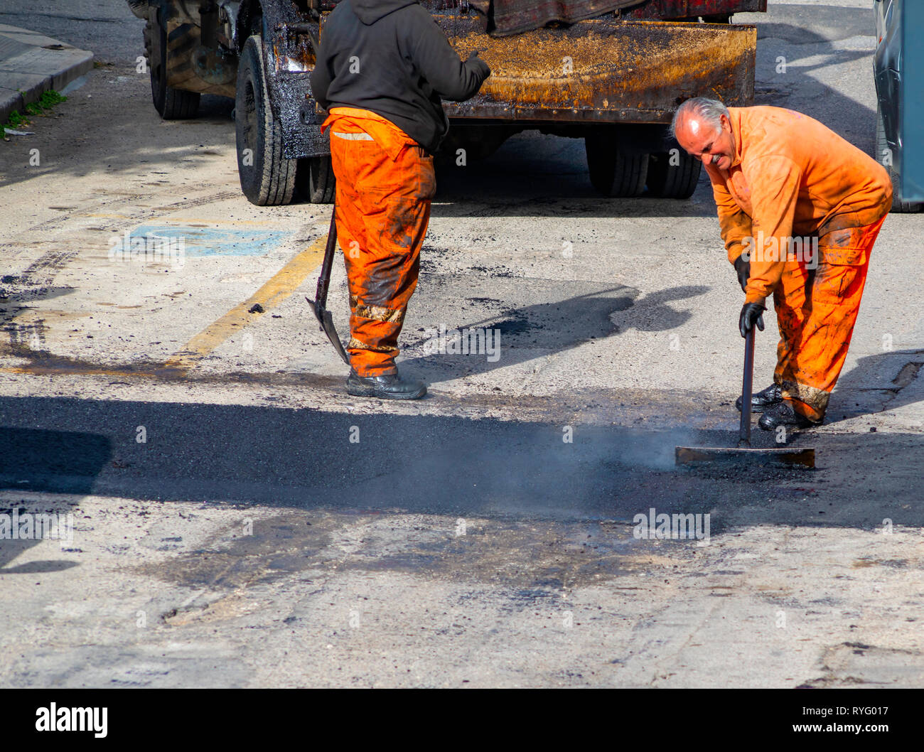 Laying asphalt with a roller hi-res stock photography and images - Alamy