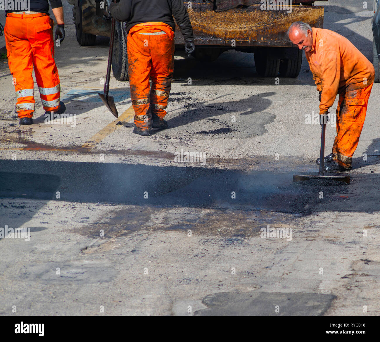 Laying asphalt with a roller hi-res stock photography and images - Alamy