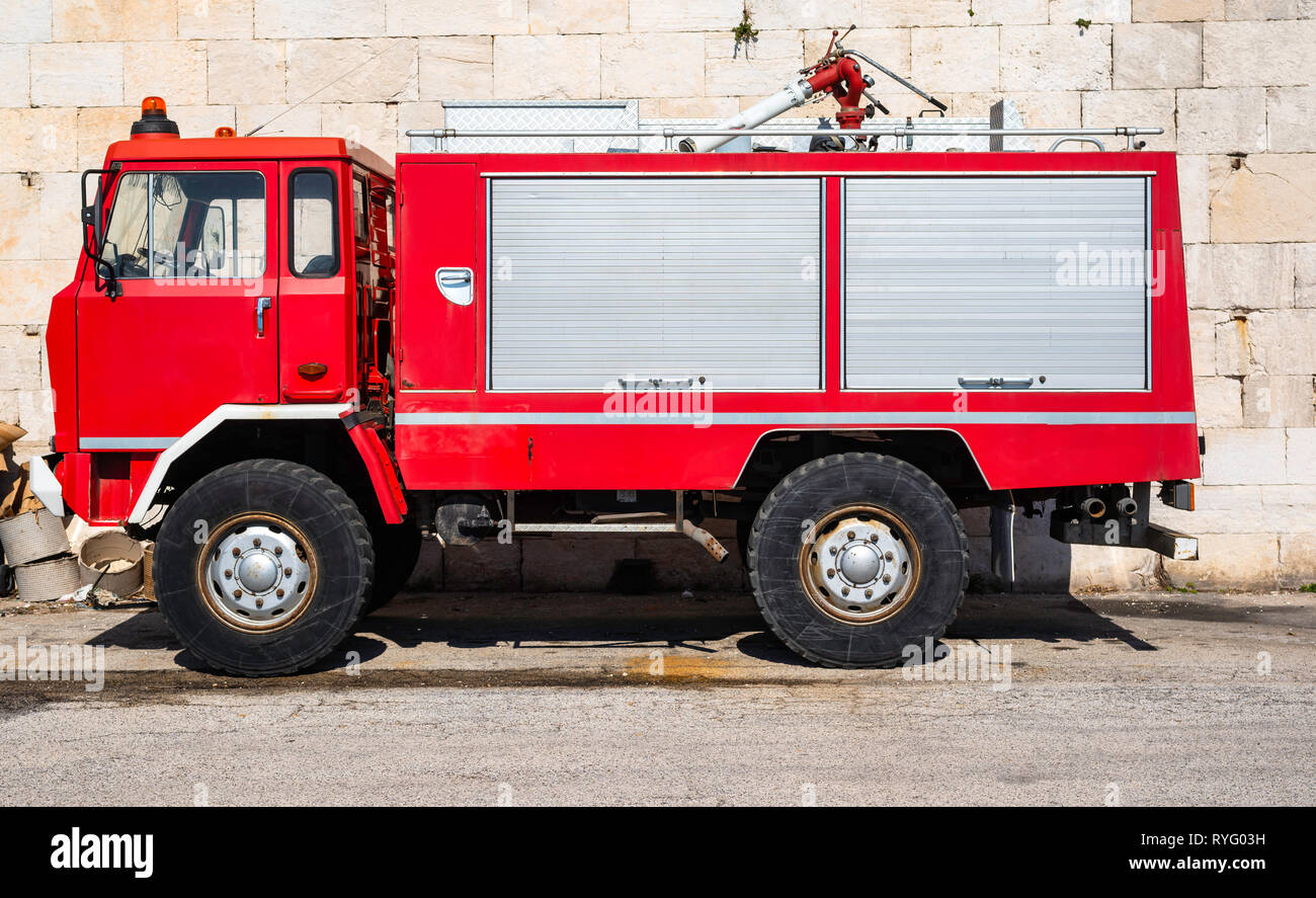 Fire rescue vehicle. Big red rescue car of Italy Stock Photo - Alamy