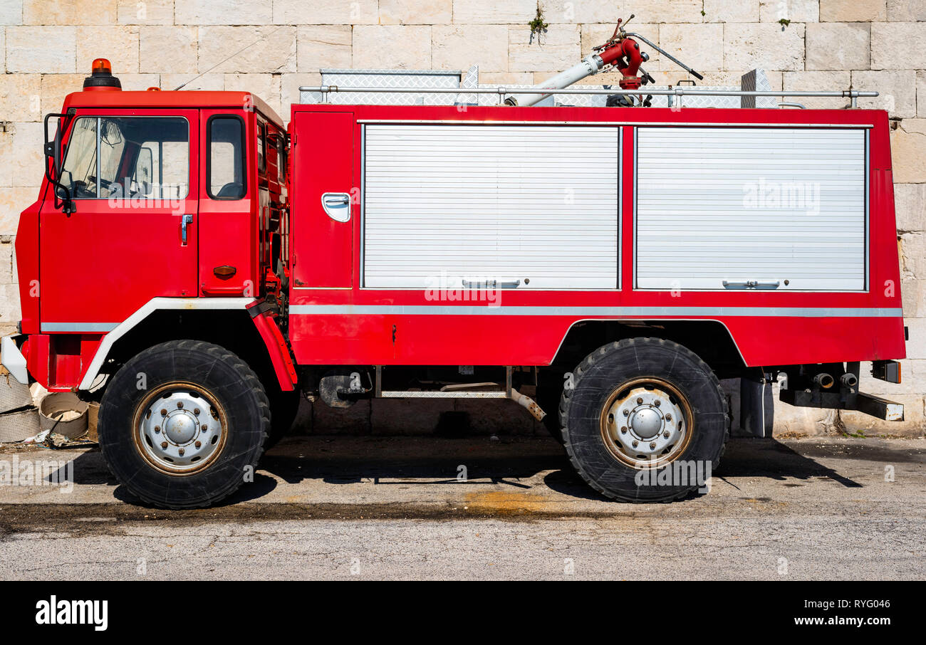 Fire rescue vehicle. Big red rescue car of Italy Stock Photo - Alamy