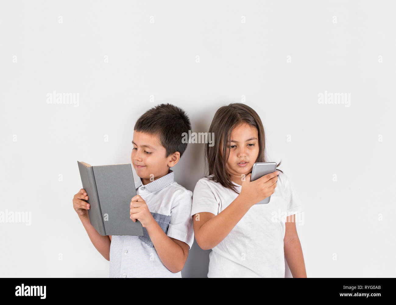 Boy And Girl With Mobile And Textbook High Resolution Stock Photography ...