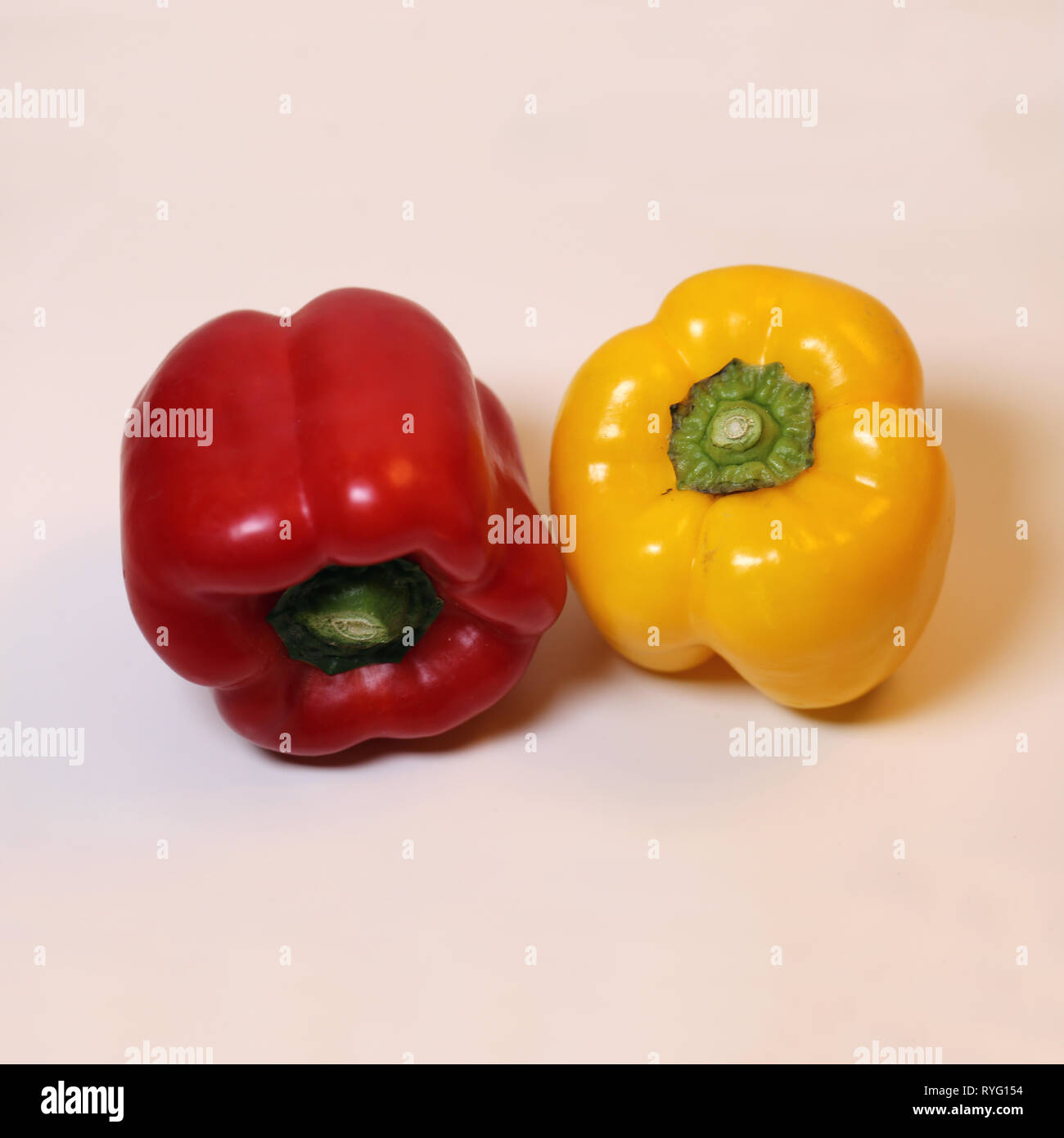Colorful bell peppers on a white table. Beautiful still life image of ...