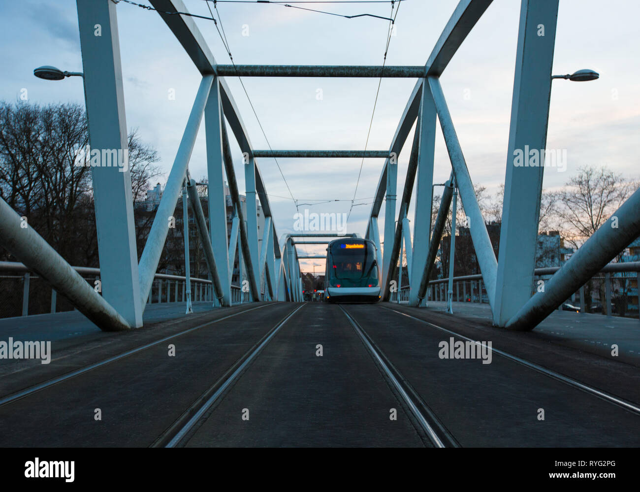 Modern train crossing the railroad bridge, evening time background in ...