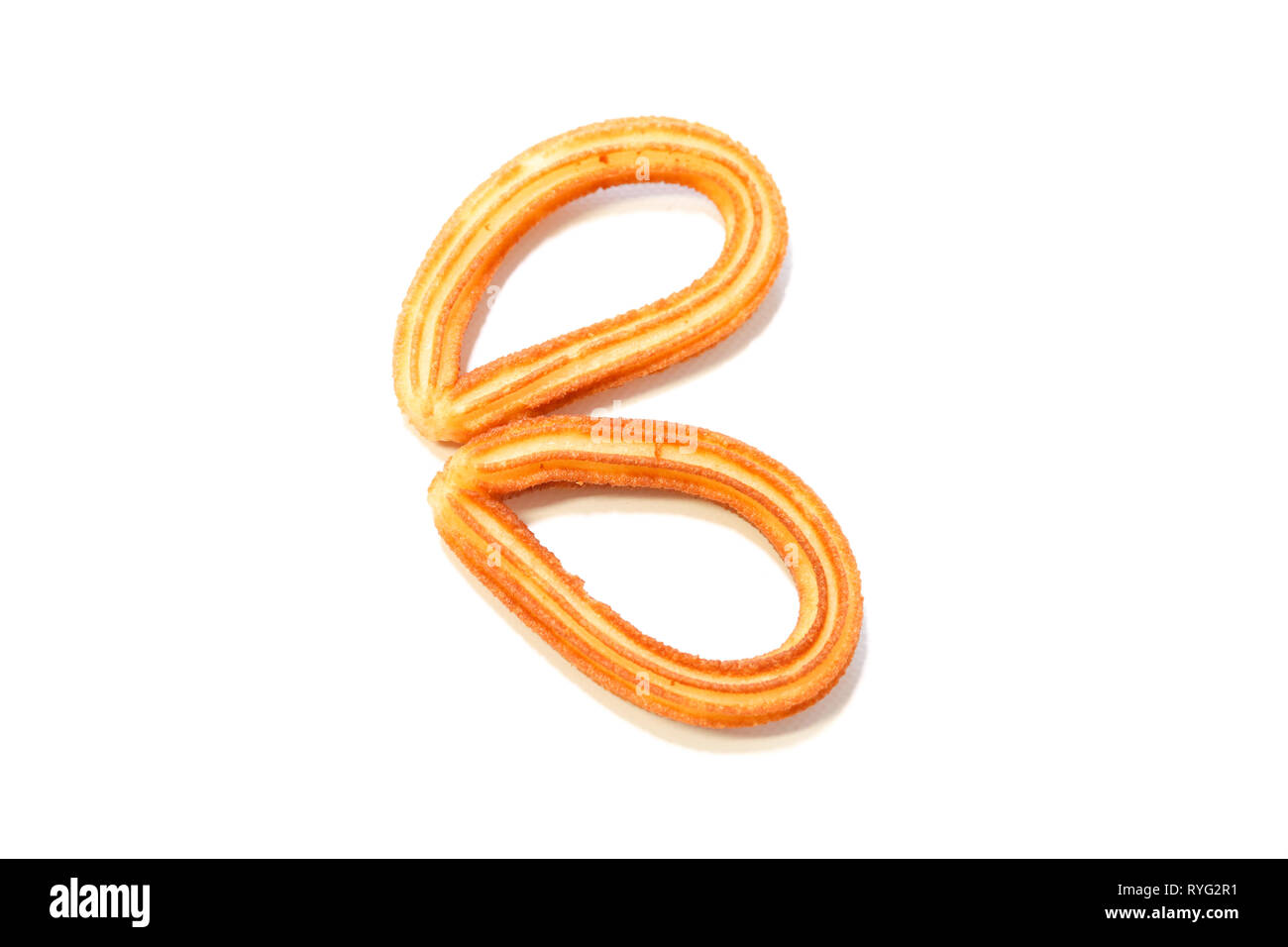 two spanish fritters on white background Stock Photo - Alamy