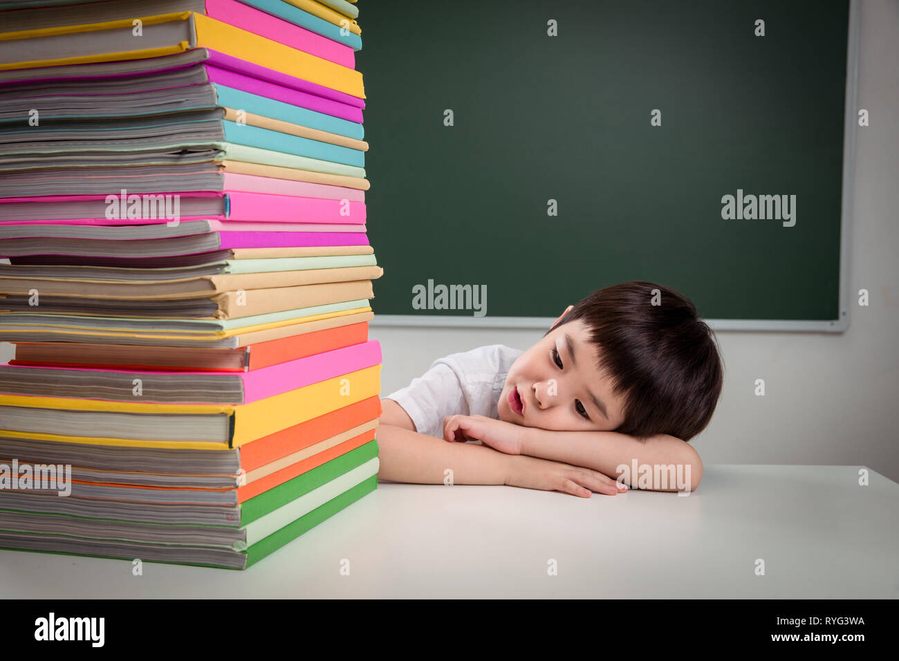 Primary school students and textbooks Stock Photo - Alamy