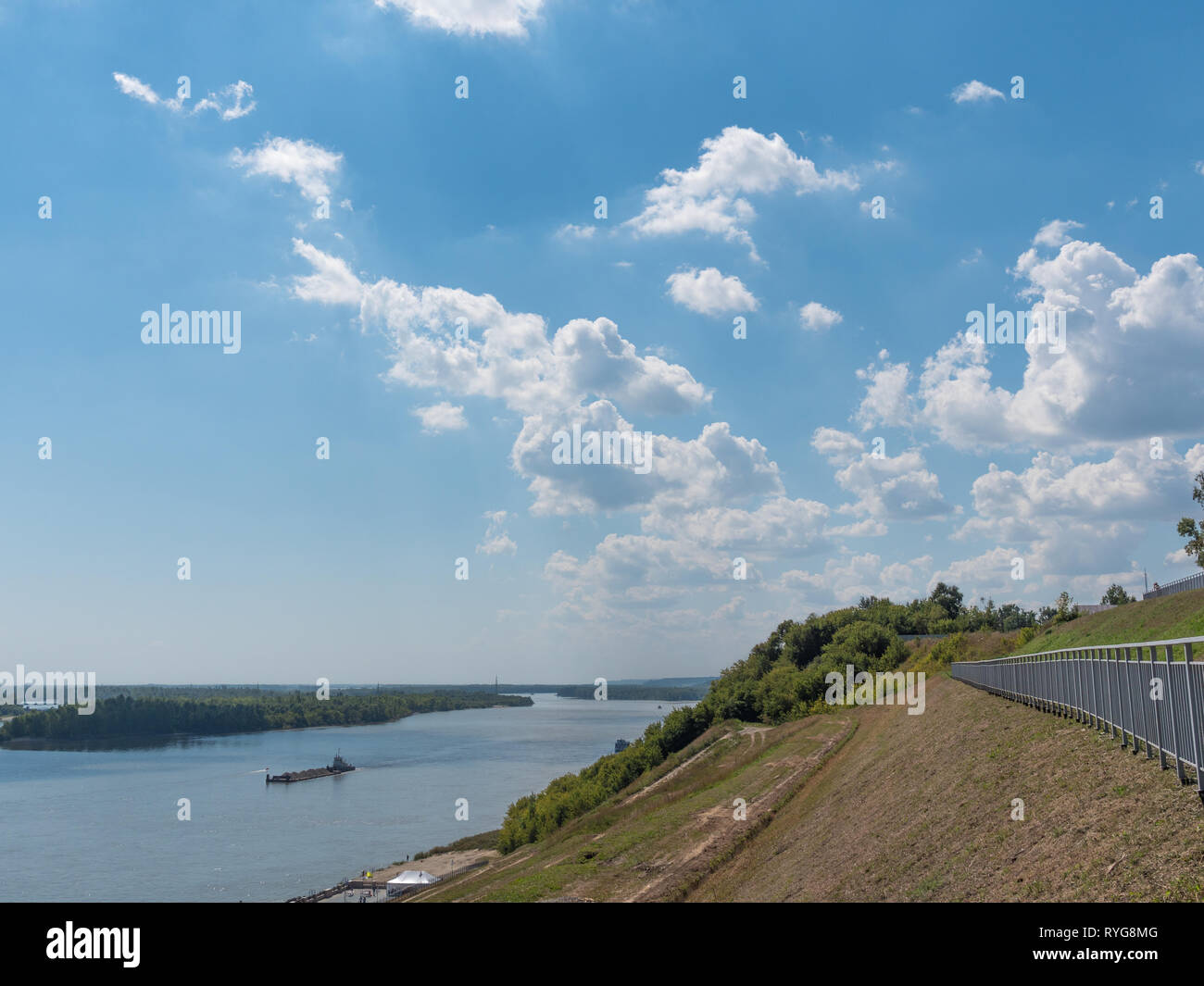 Landscape river in a forest with floating motorboats Stock Photo - Alamy