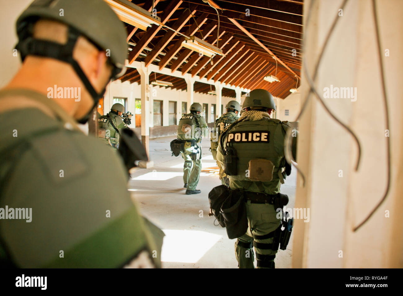 Group of police officers inside a building during an exercise at ...