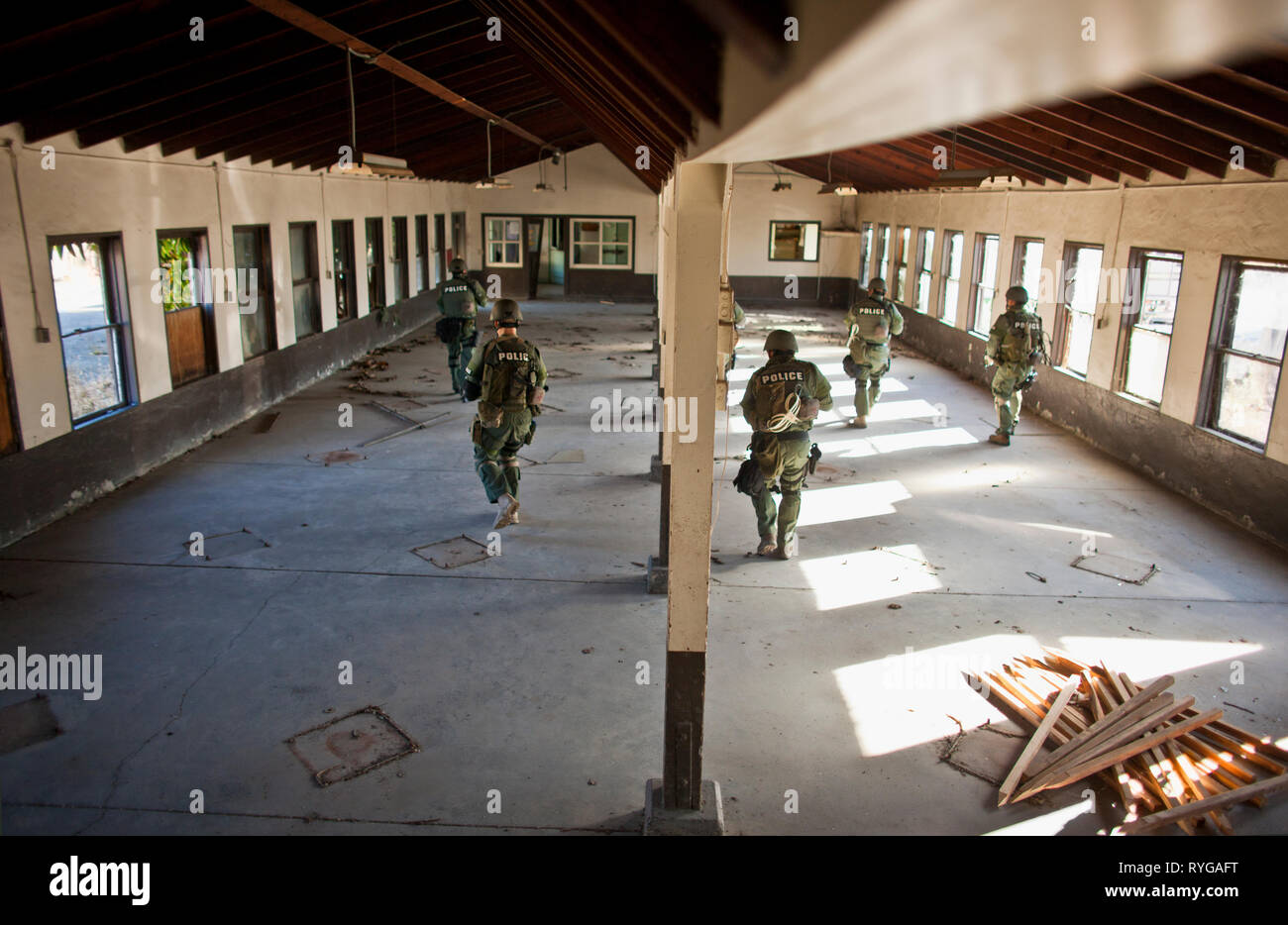 Group of police officers inside a building during an exercise at ...