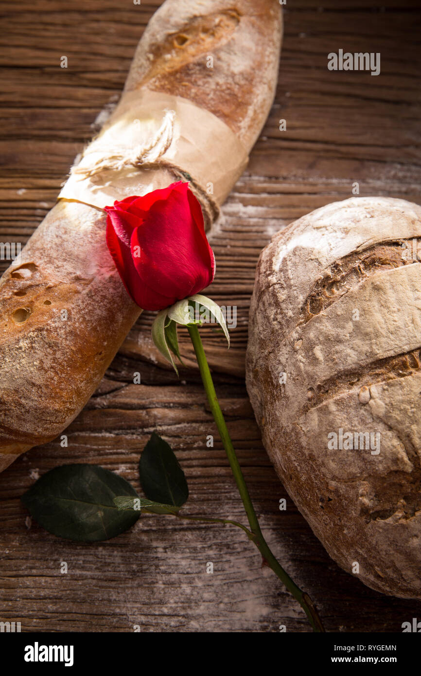 The roses and bread Stock Photo - Alamy
