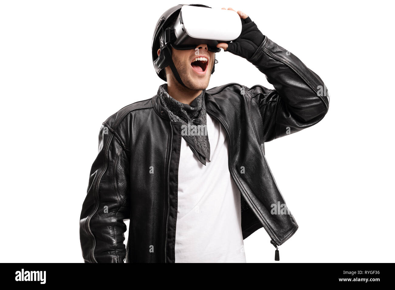Man in a leather jacket watching on a VR headset isolated on white ...