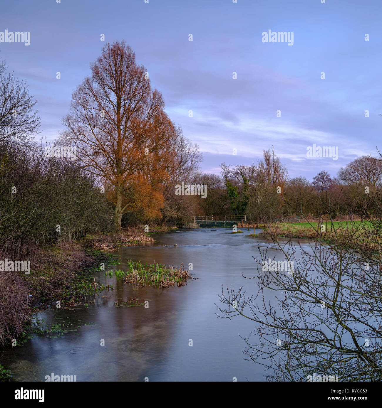 The River Meon at sunset with Old Winchester Hill, Exton, Hampshire, UK ...