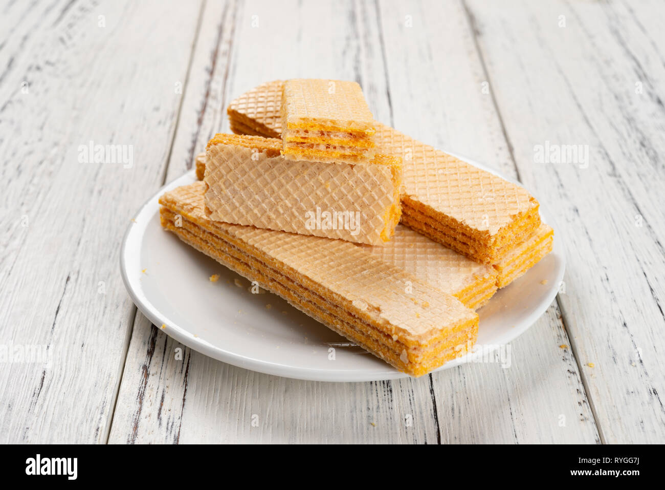 wafer blocks on white wood background Stock Photo - Alamy