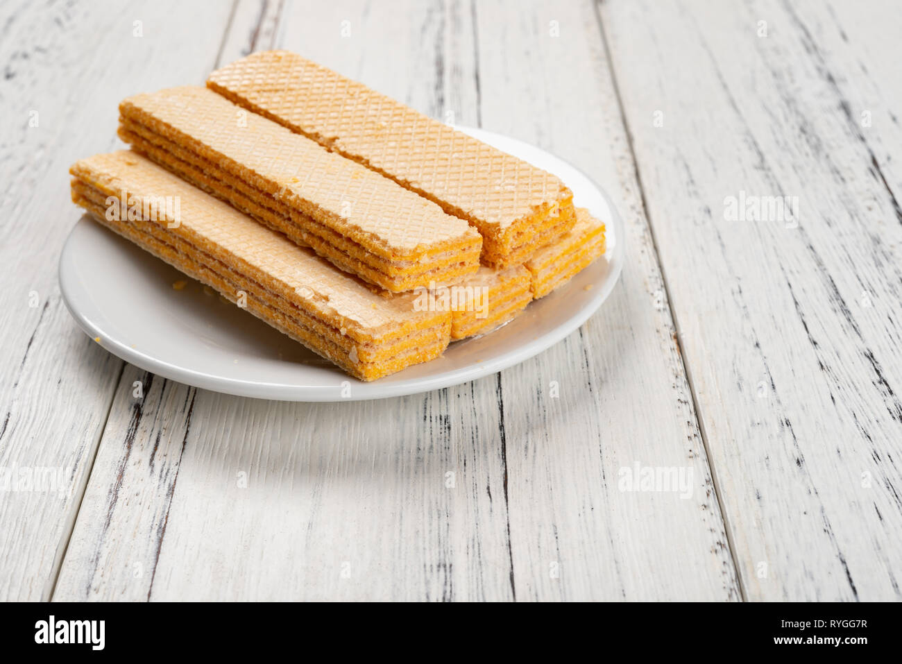 wafer blocks on white wood background Stock Photo - Alamy