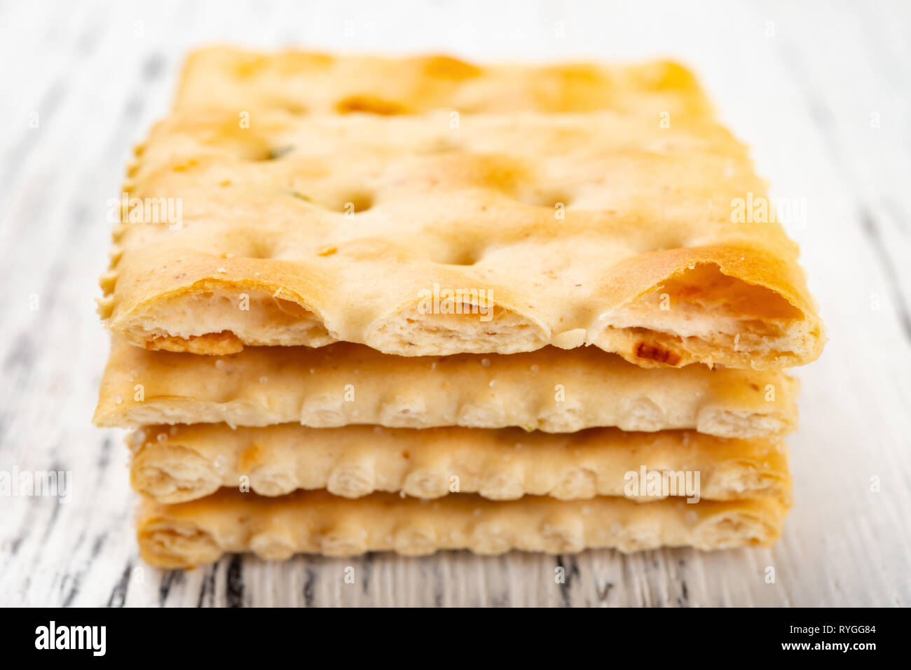 crispy crackers stacked up and the top cut into half Stock Photo - Alamy