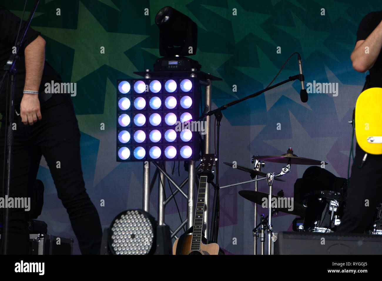 Cello Music instruments on a stage guitar room Stock Photo - Alamy