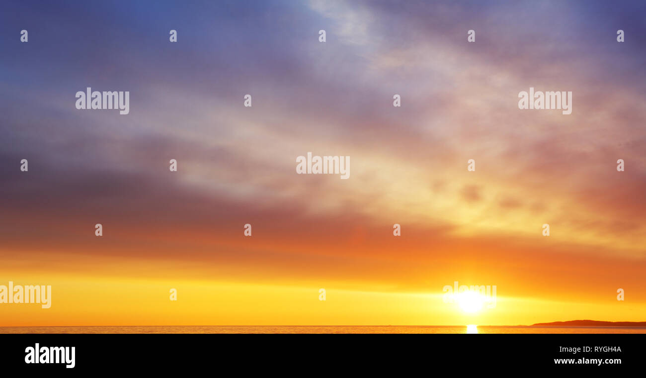 Sunset / sunrise with clouds, light rays and other atmospheric effect ...