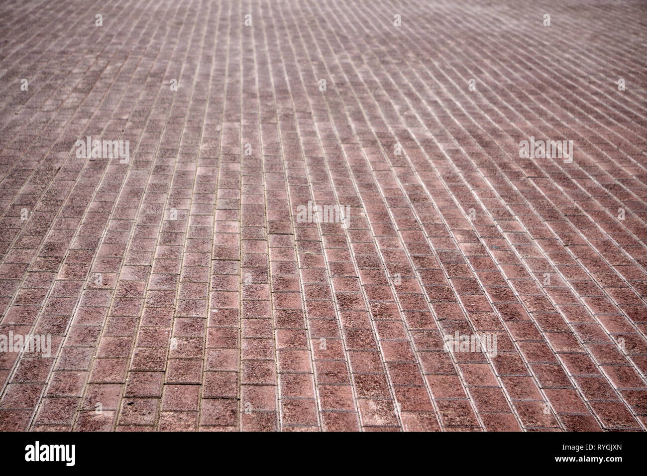 Red brick paving stones on a sidewalk Stock Photo - Alamy