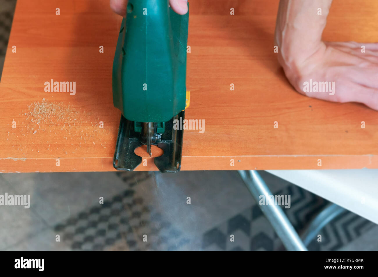 electric saw work on wood, the cutting of furniture parts Stock Photo ...