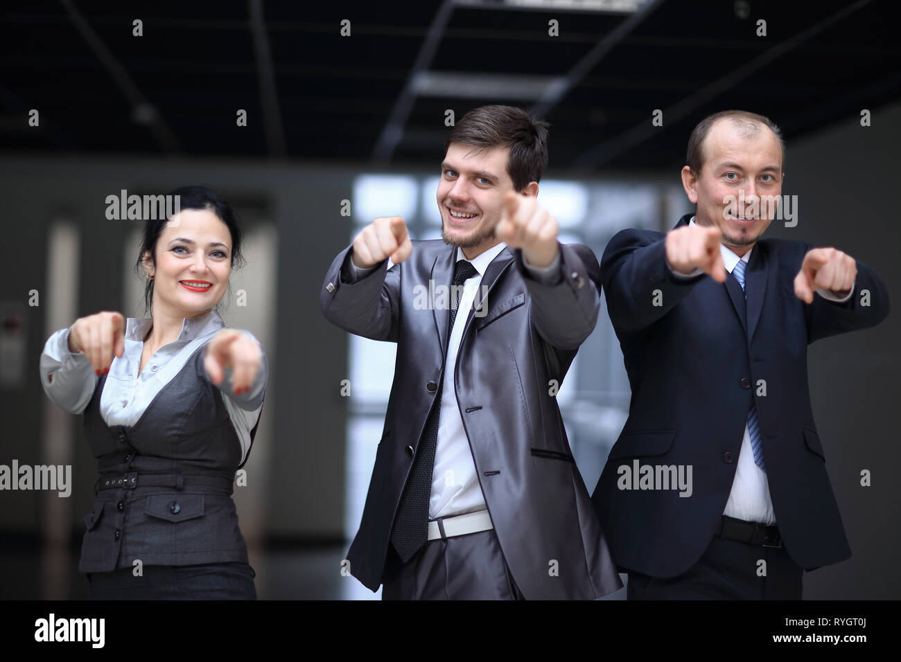 close up.successful business team pointing at you Stock Photo - Alamy