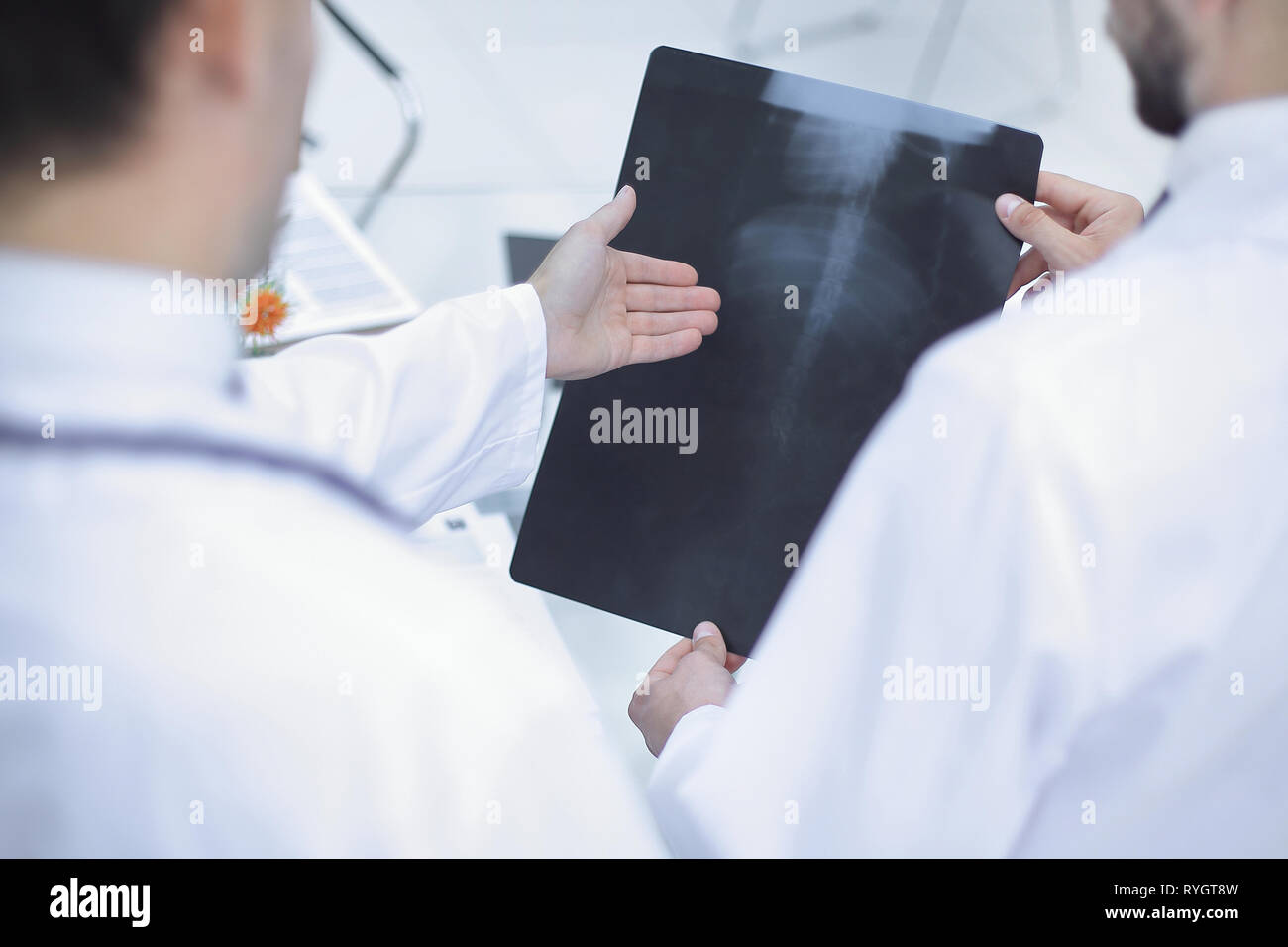close up. diagnoses discussing the x-ray of the patient.rear view Stock ...