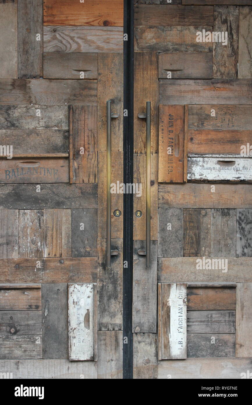 Rustic, sturdy, and heavy authentic wooden doors Stock Photo - Alamy