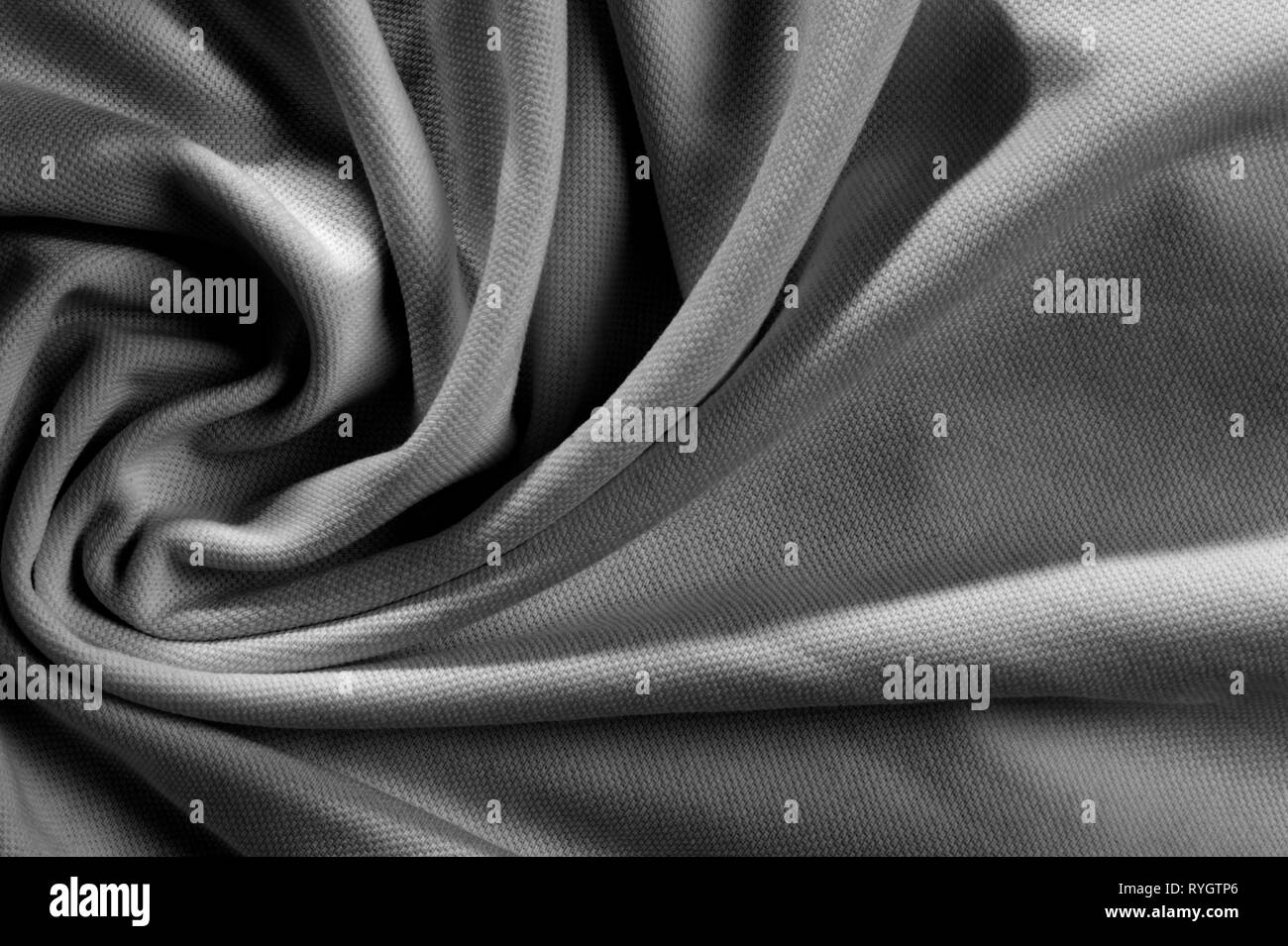 new wrinkled textile fabric dark gray color Stock Photo - Alamy
