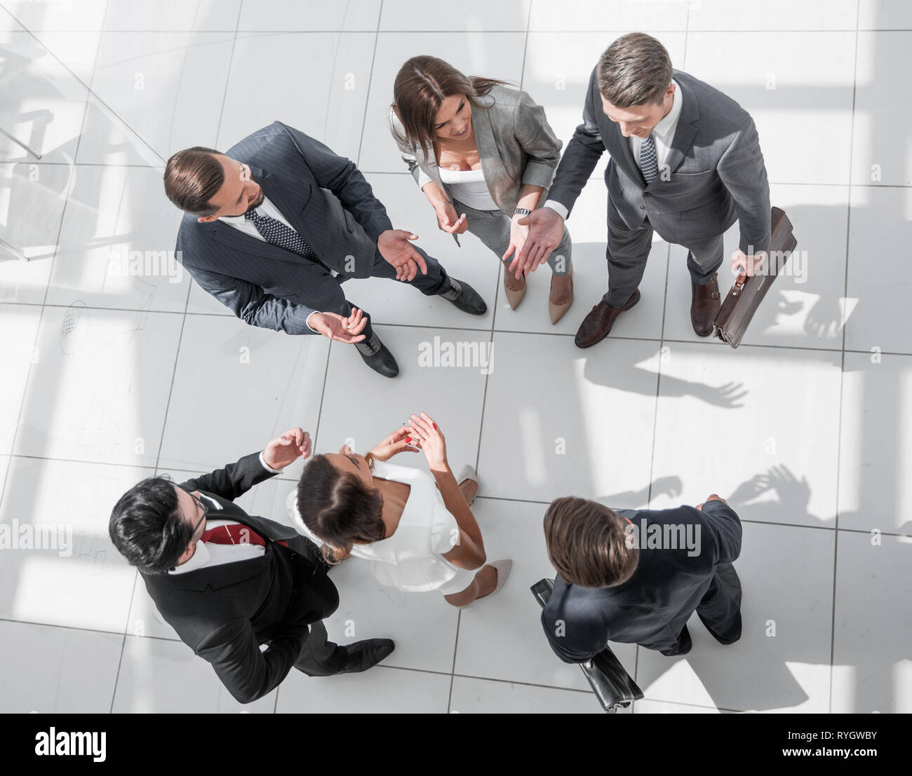 top view. employees discussing important issue Stock Photo - Alamy